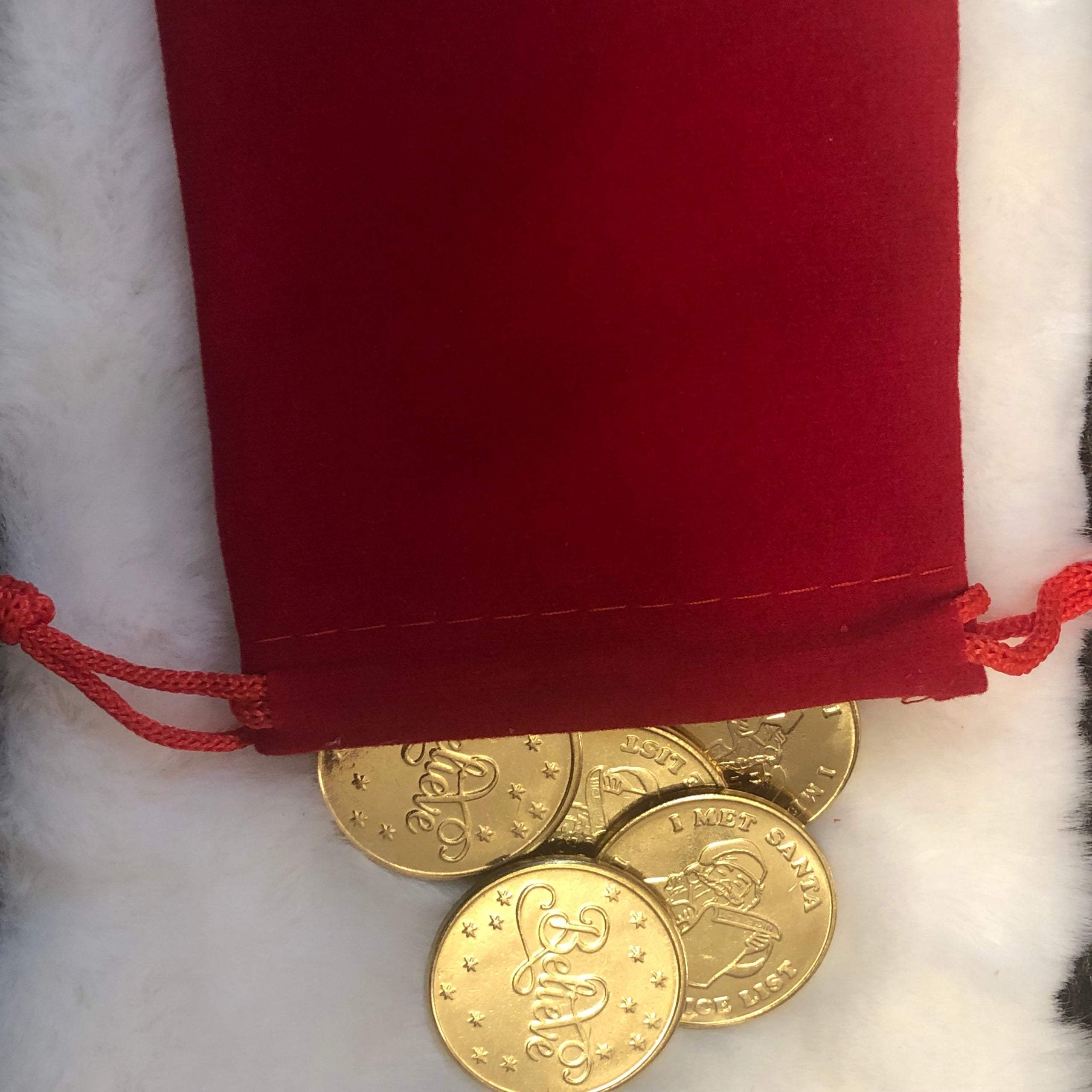 "NICE LIST" coins in red pouch | The North Pole Outfitter